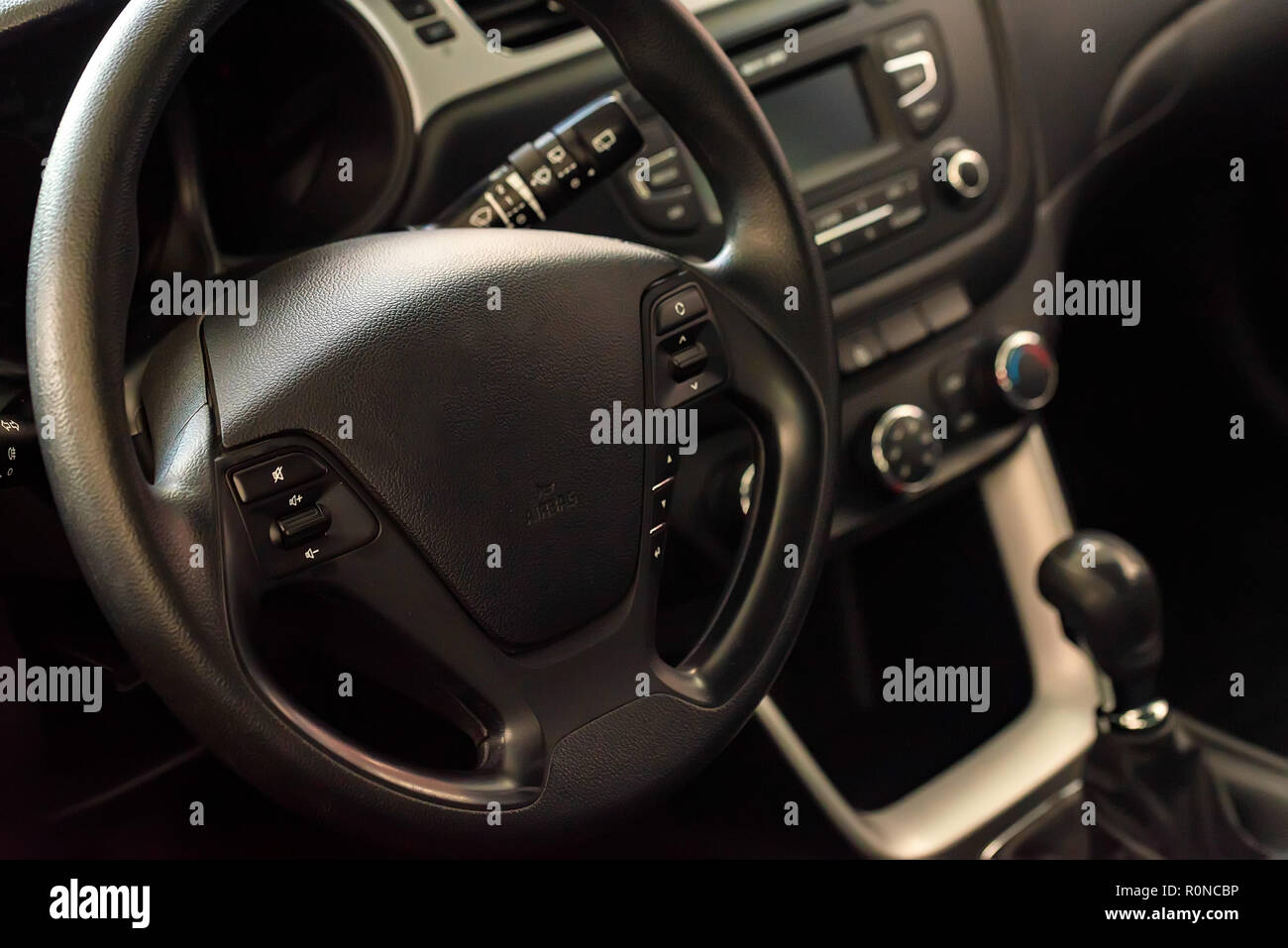 Steering wheel of modern car close up Stock Photo - Alamy