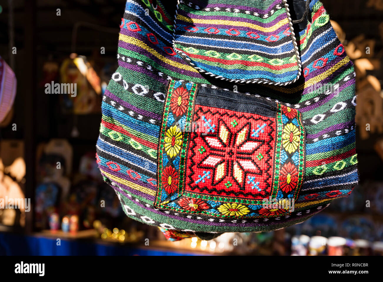 Colorful ethnic hand-made bag for sale in market Stock Photo - Alamy