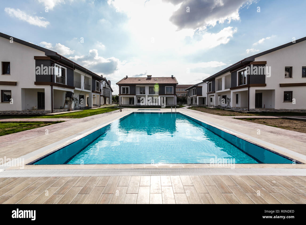 Communal swimming pool for residents of a newly built apartments site ...
