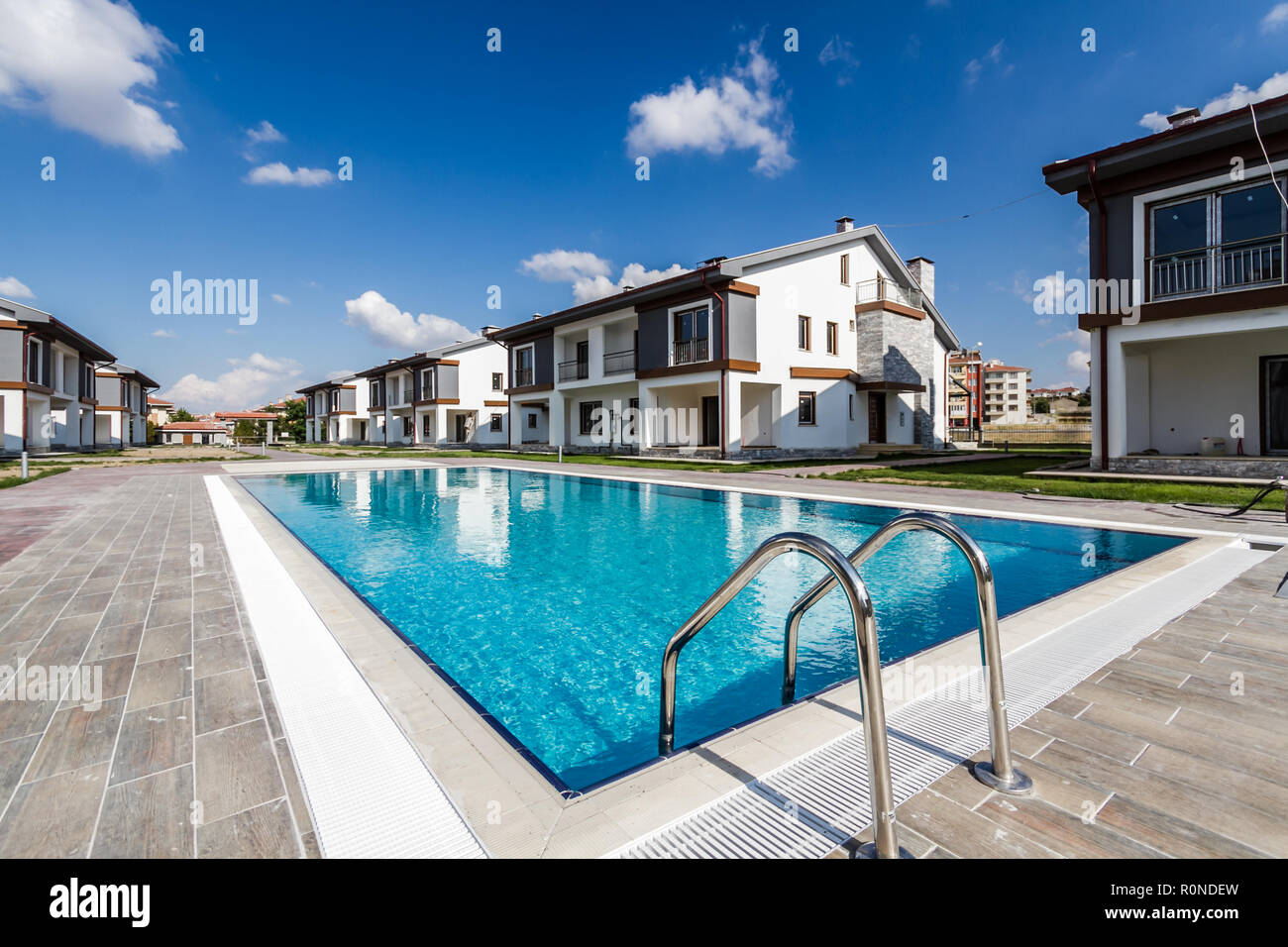 Communal swimming pool for residents of a newly built apartments site ...