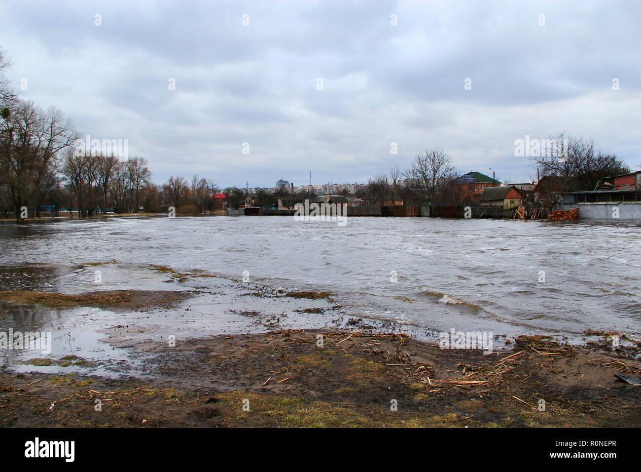 Flooding of river in spring in town during melting of snow. Flooding ...