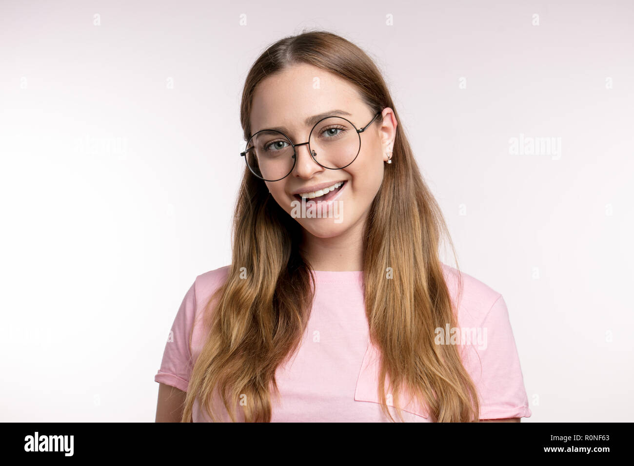 attractive singer dressed casually singing her favourite song Stock ...