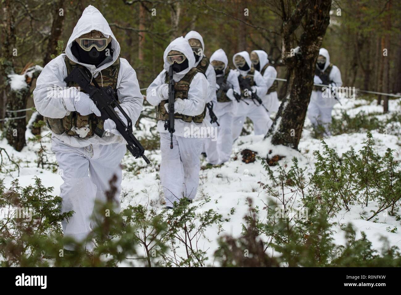 Montenegro soldiers with the 1st Infantry Company in winter camouflage ...