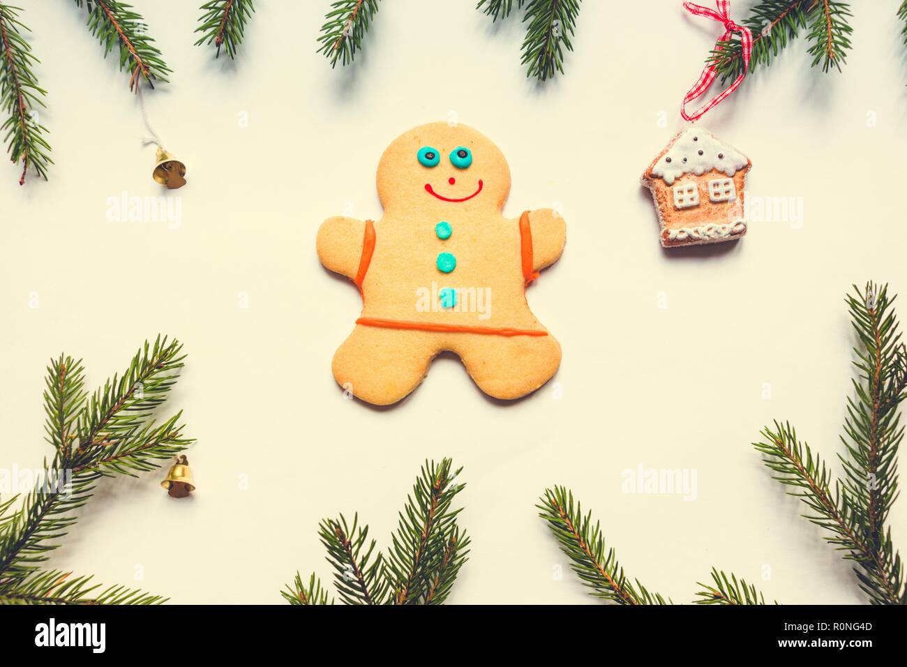 Delicious baked gingerbread man lies on a white background. Around it ...