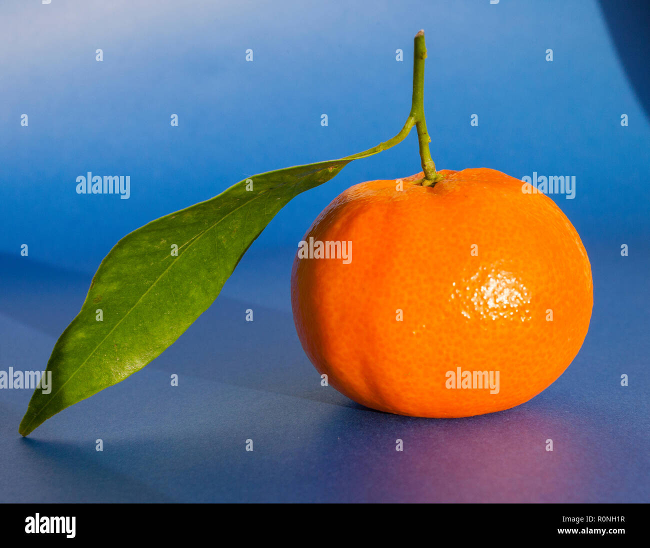 Orange with stalk and leaf hi-res stock photography and images - Alamy
