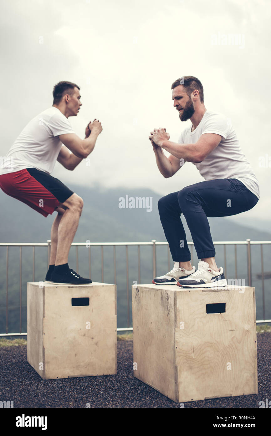 Group young friends doing jump hi-res stock photography and images - Alamy