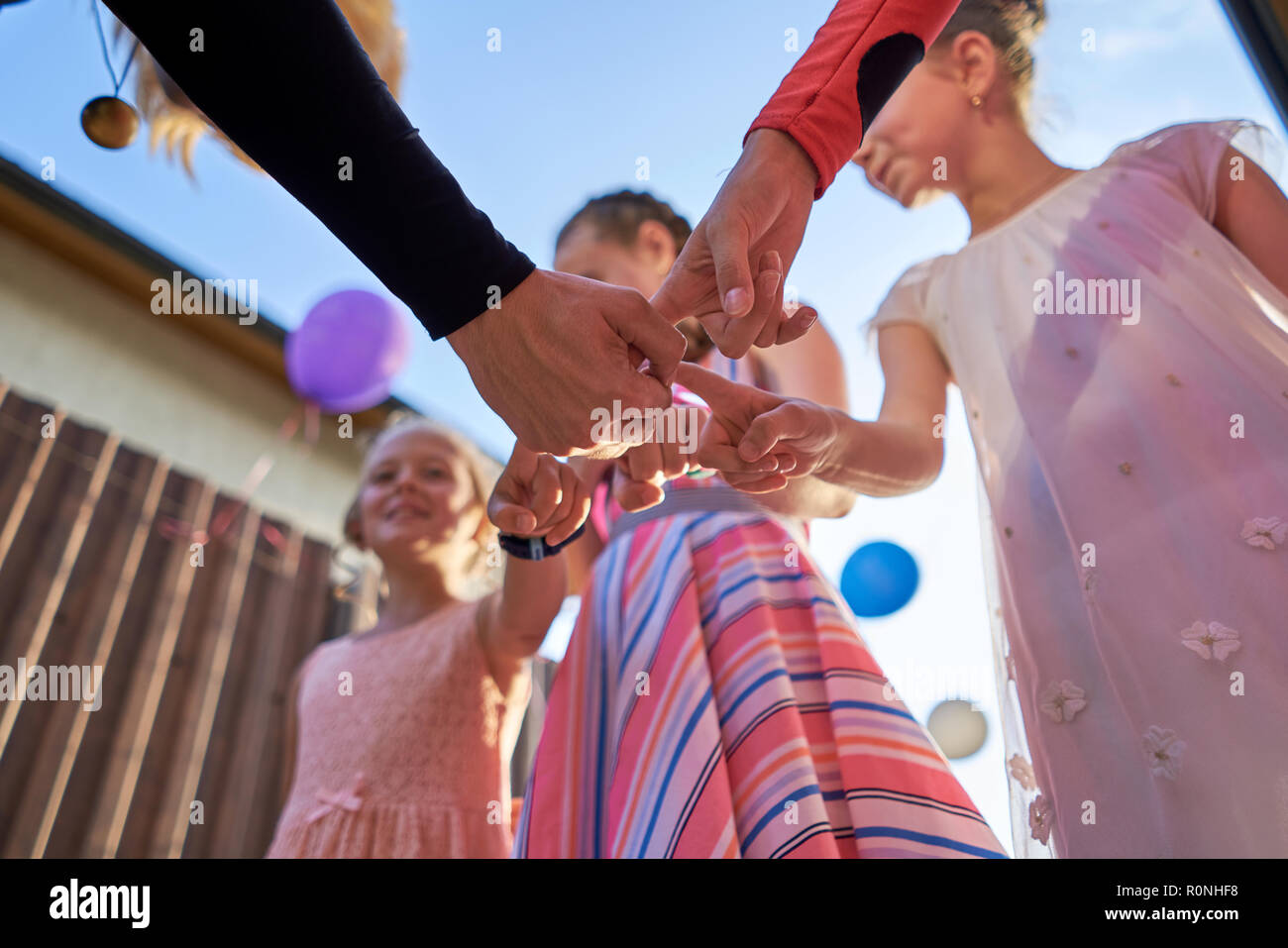Kids put hands up hi-res stock photography and images - Alamy