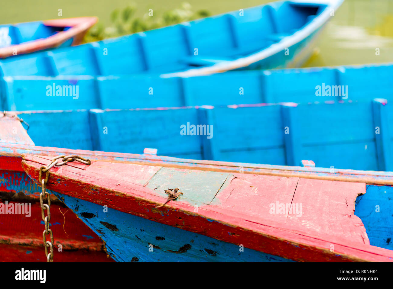Detail of colourful boat on Phewa lake in Pokhara, the most popular and ...