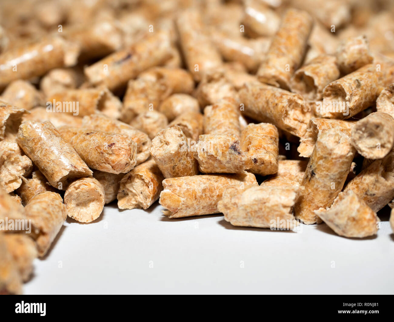 Wooden pellets close-up beackground Stock Photo - Alamy