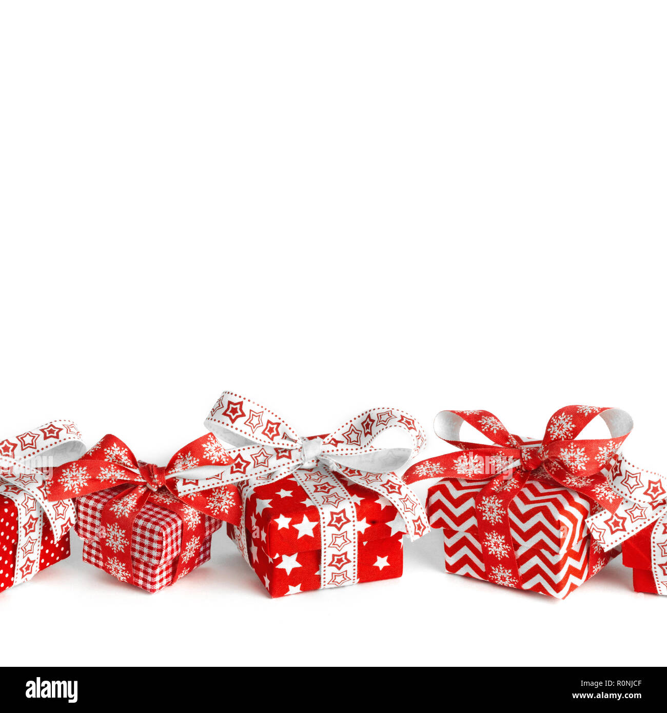 Christmas gift boxes isolated on white background Stock Photo - Alamy