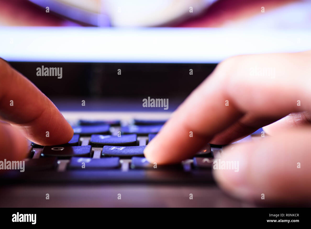 Girl typing on computer hi-res stock photography and images - Alamy