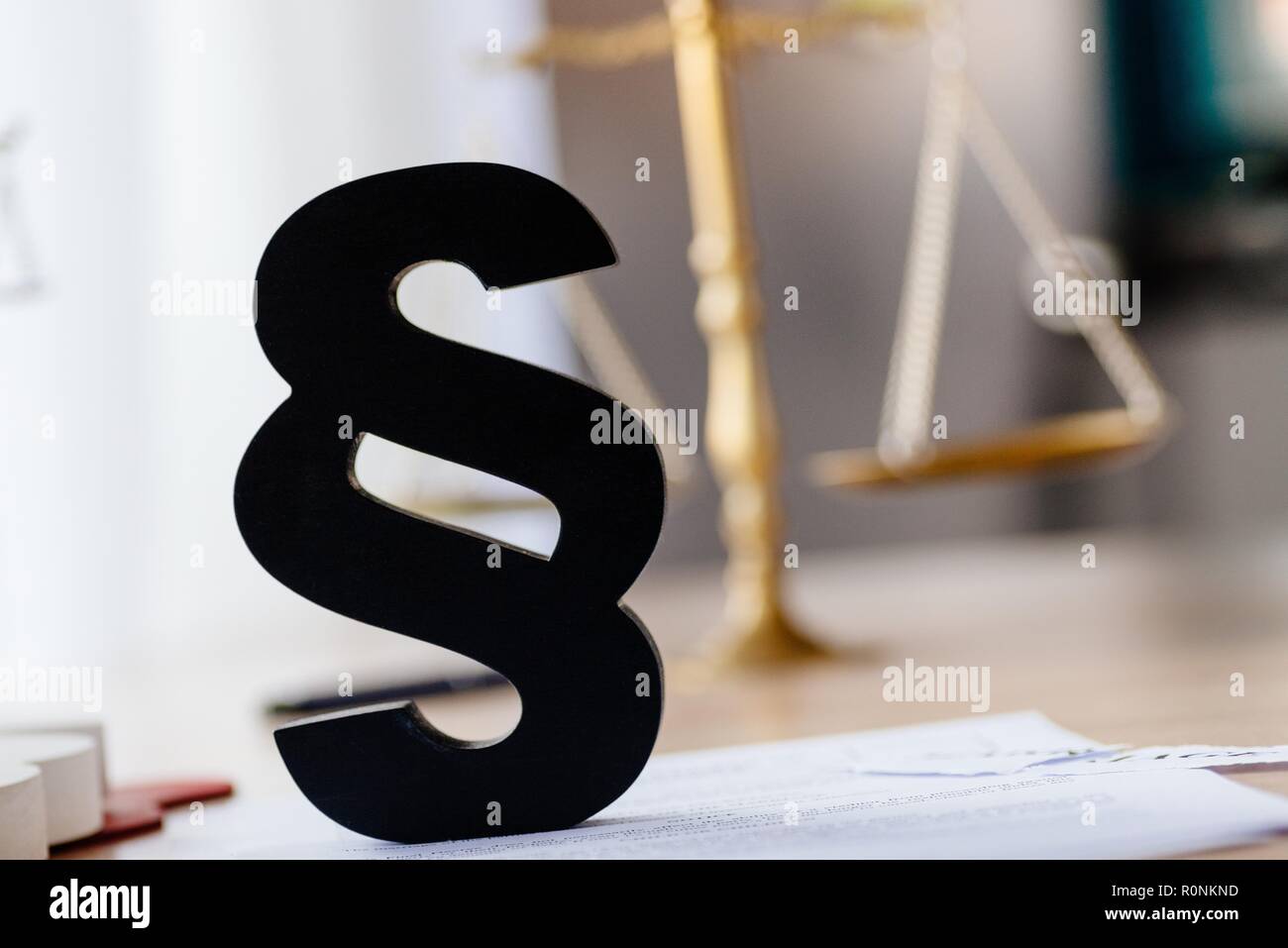 Wooden paragraph, the symbol of law and legal system Stock Photo - Alamy