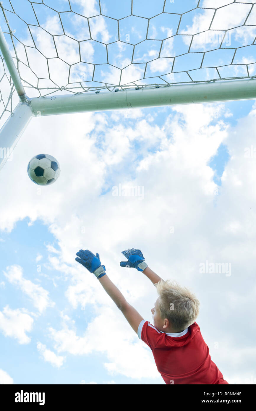 Child scoring goal hi-res stock photography and images - Alamy