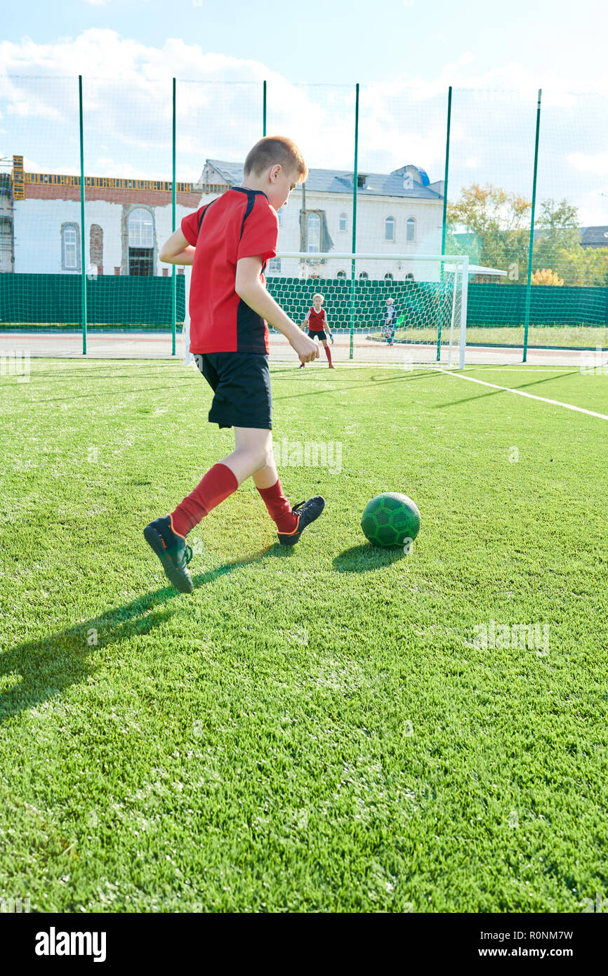 Boys Playing Football Outdoors Stock Photo - Alamy
