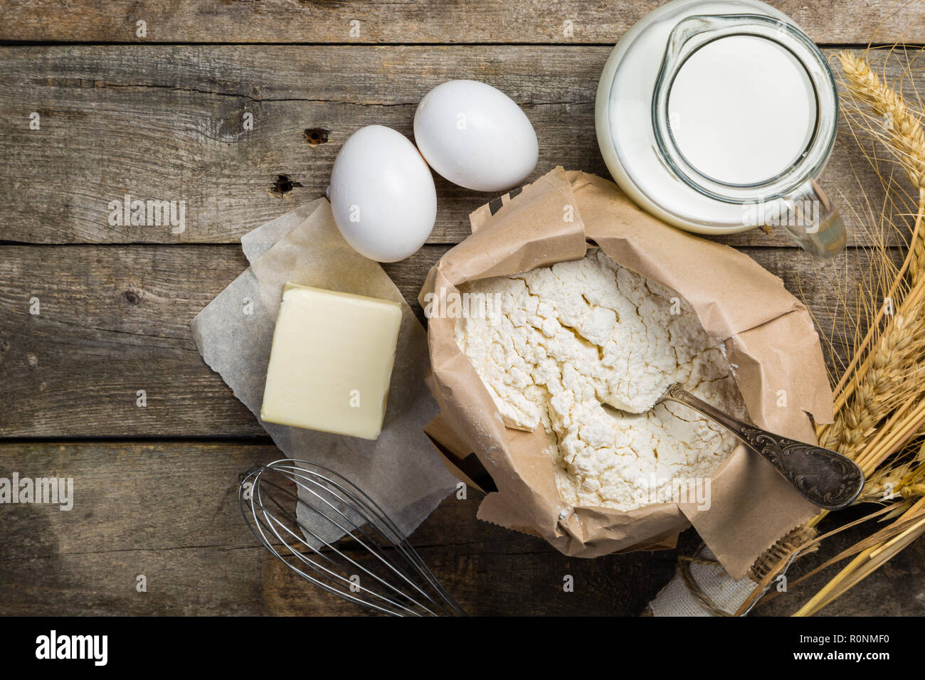 Baking concept - ingredients on rustic wood background Stock Photo - Alamy
