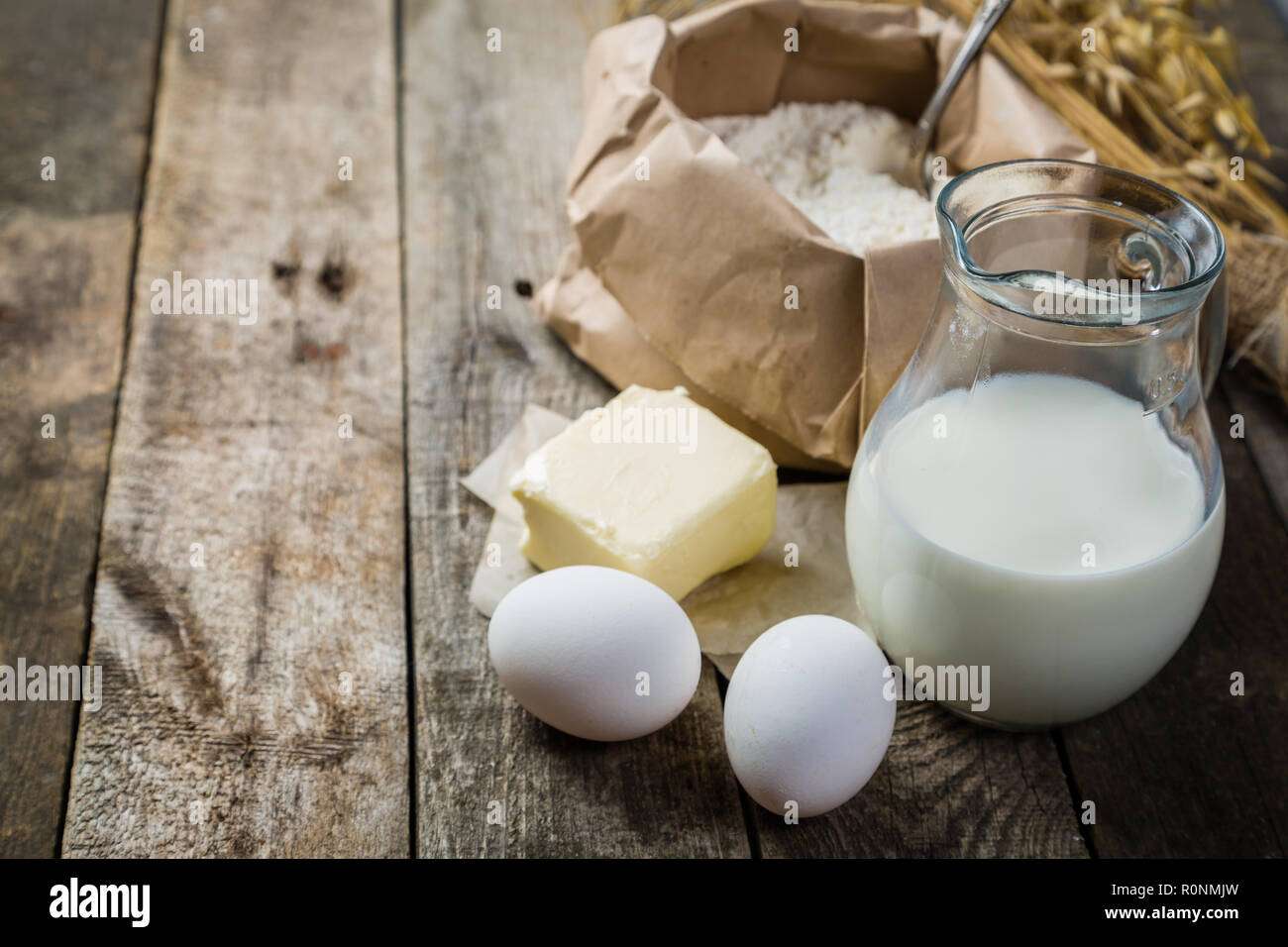 Baking concept - ingredients on rustic wood background Stock Photo - Alamy