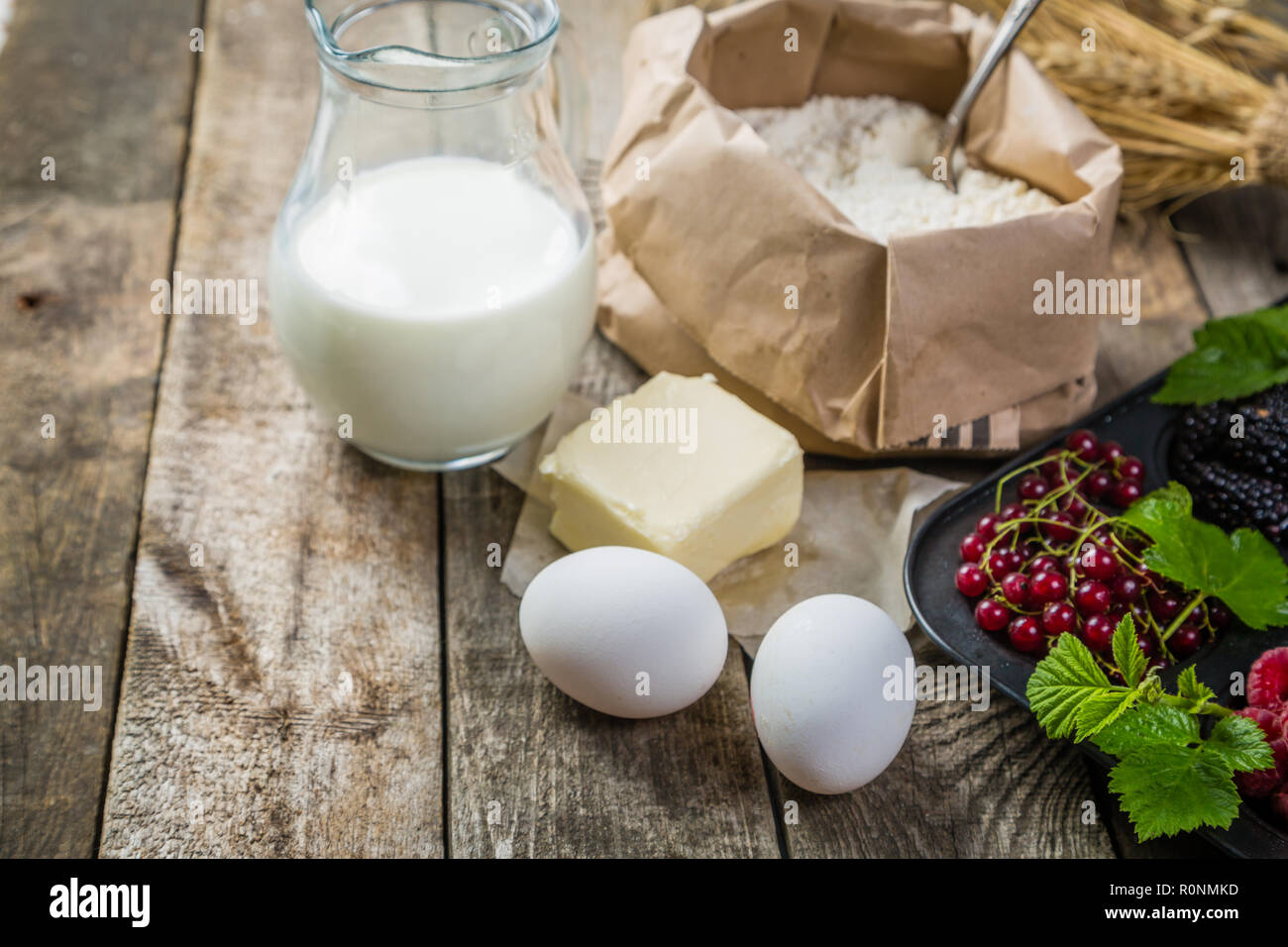 Baking concept - ingredients on rustic wood background Stock Photo - Alamy