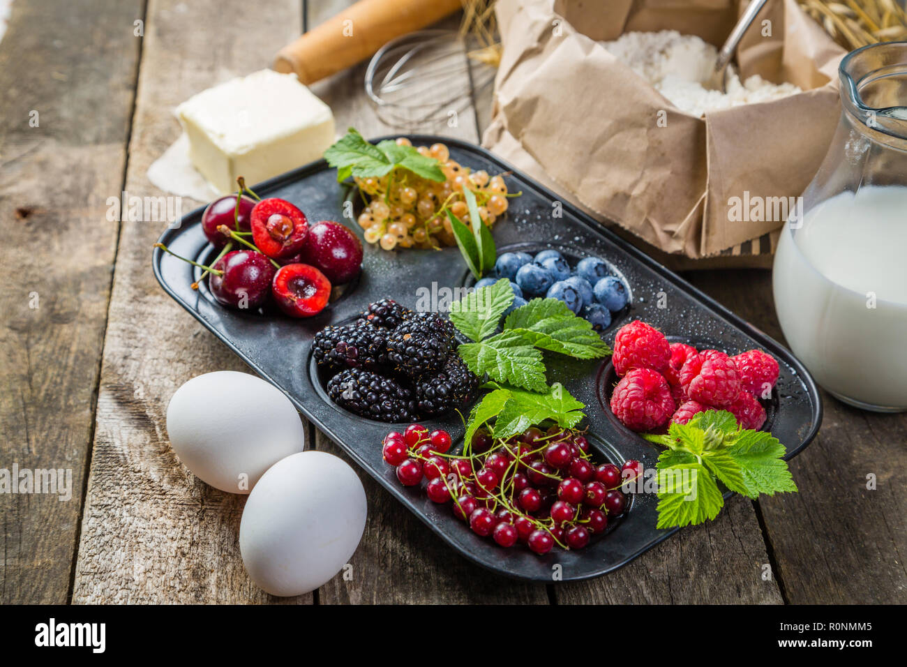 Baking concept - ingredients on rustic wood background Stock Photo - Alamy