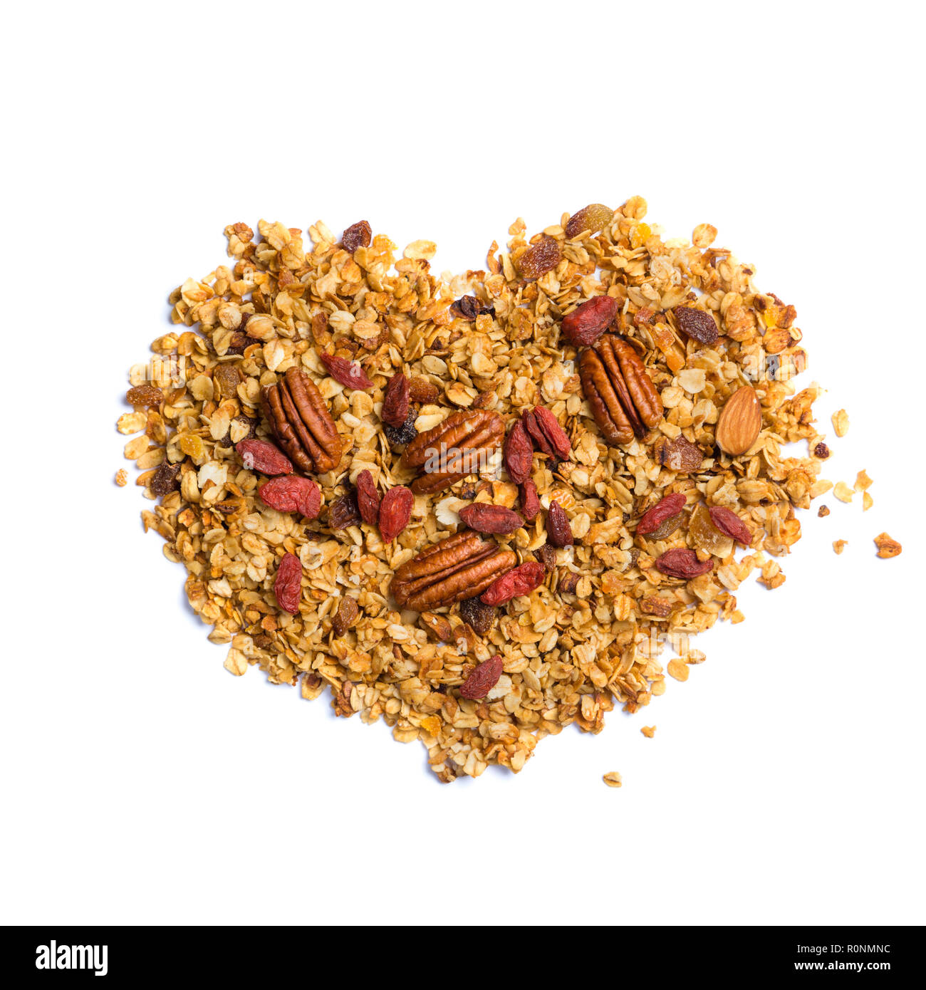 Healthy diet concept - heart shaped granola with nuts Stock Photo - Alamy