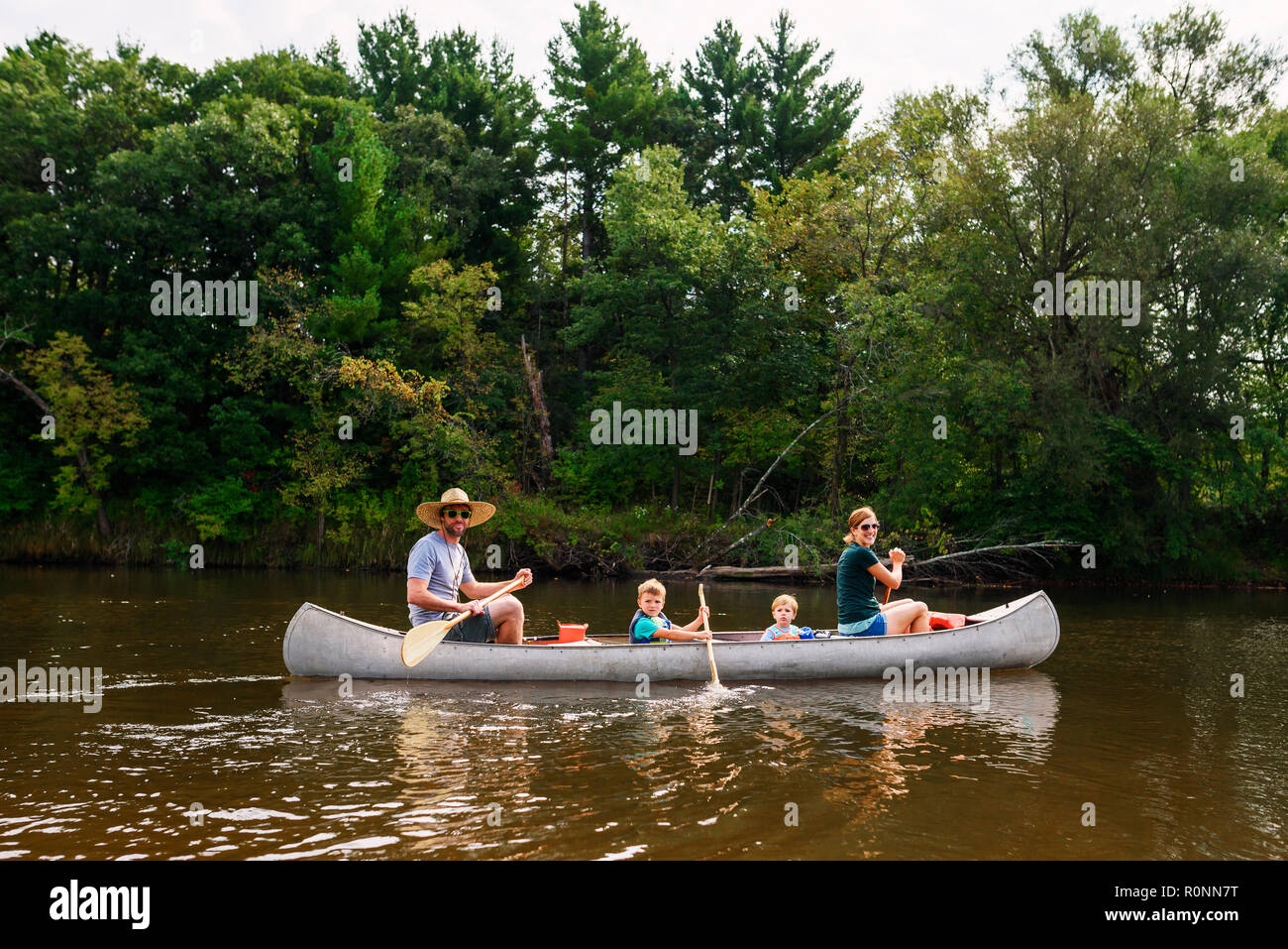 Family with two children canoeing, United States Stock Photo - Alamy