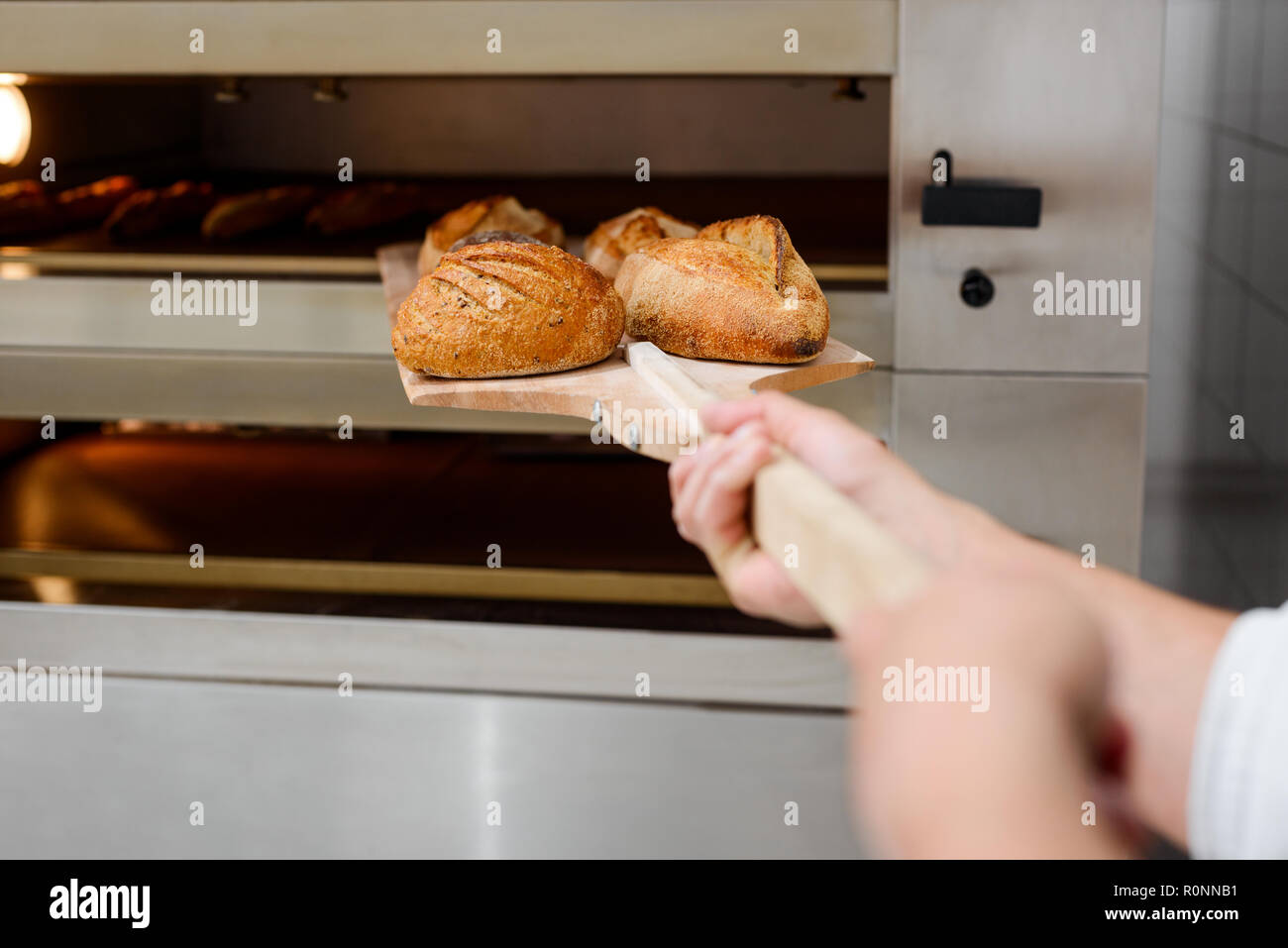Fresh hot bread out oven hi-res stock photography and images - Alamy