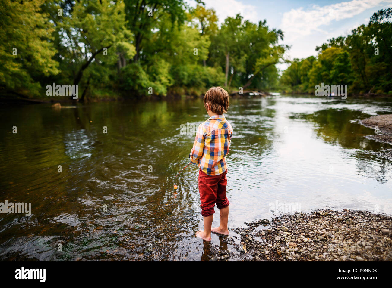 Rear View Boy Standing River High Resolution Stock Photography and ...