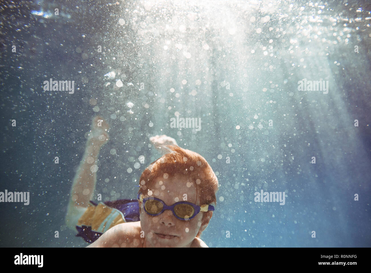Person underwater in pool hi-res stock photography and images - Alamy