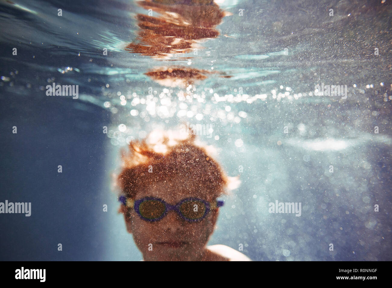 Person underwater in pool hi-res stock photography and images - Alamy