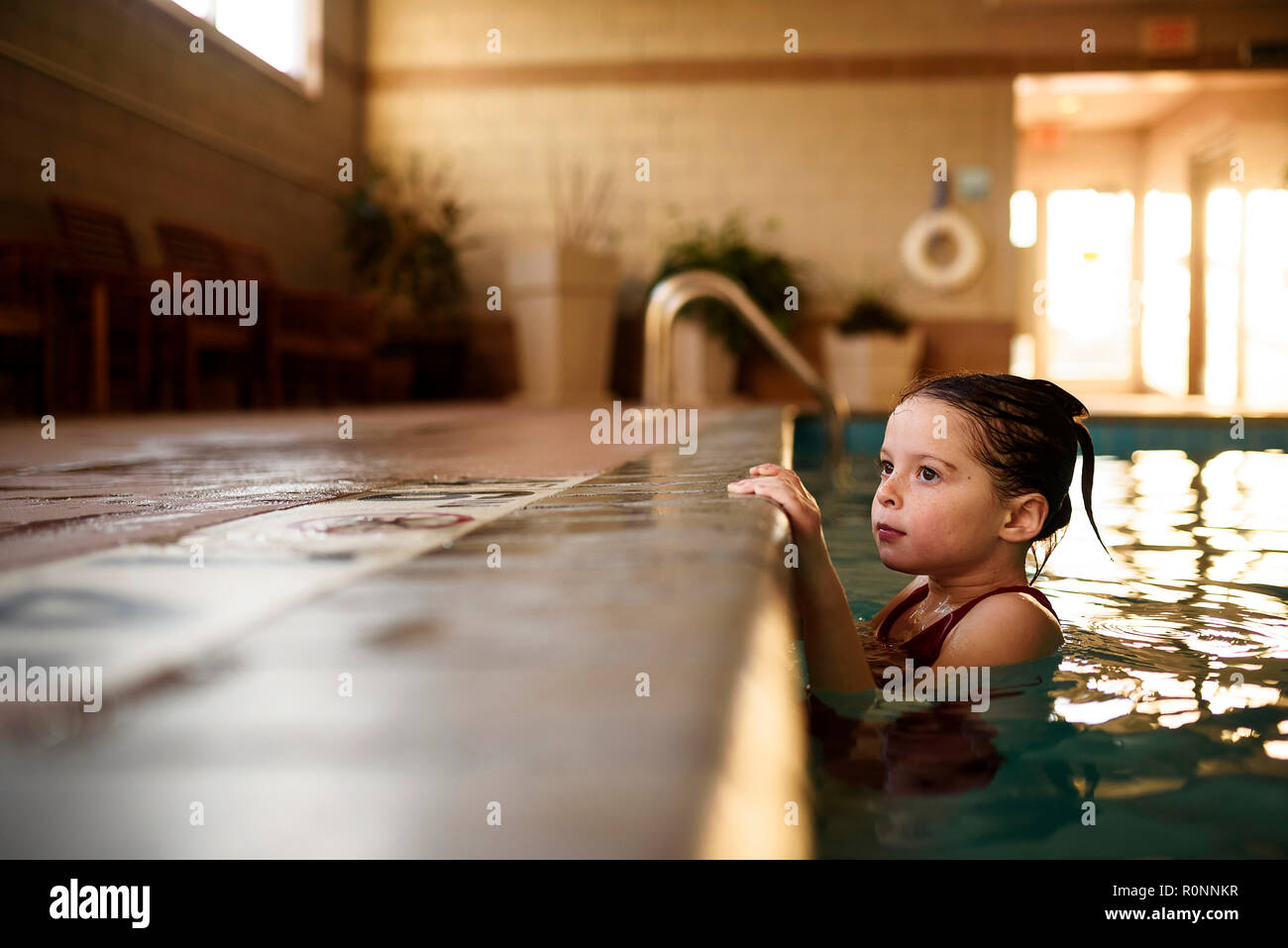 Holding edge of swimming pool hi-res stock photography and images - Alamy