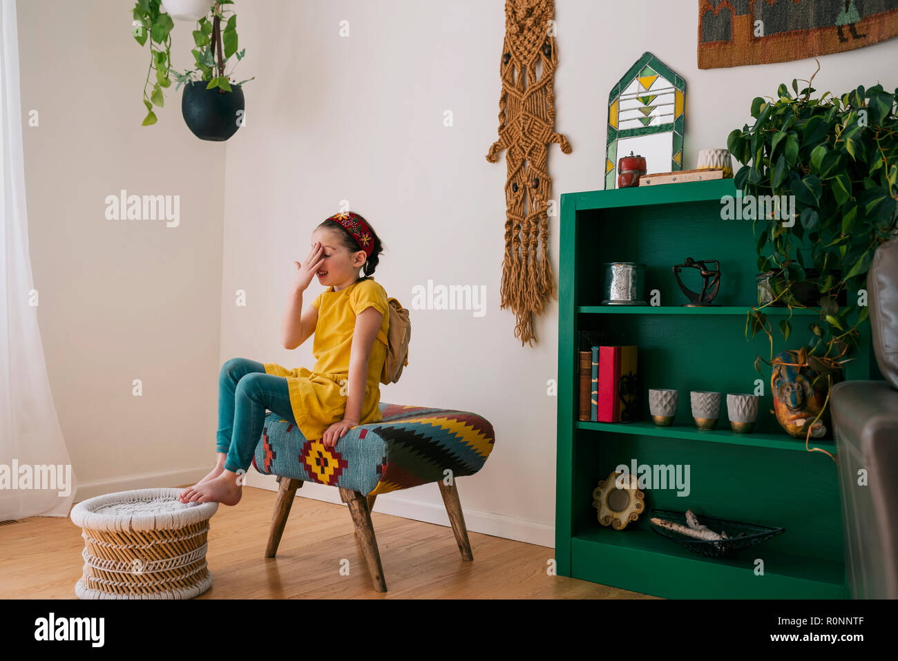 Human footstool hi-res stock photography and images - Alamy