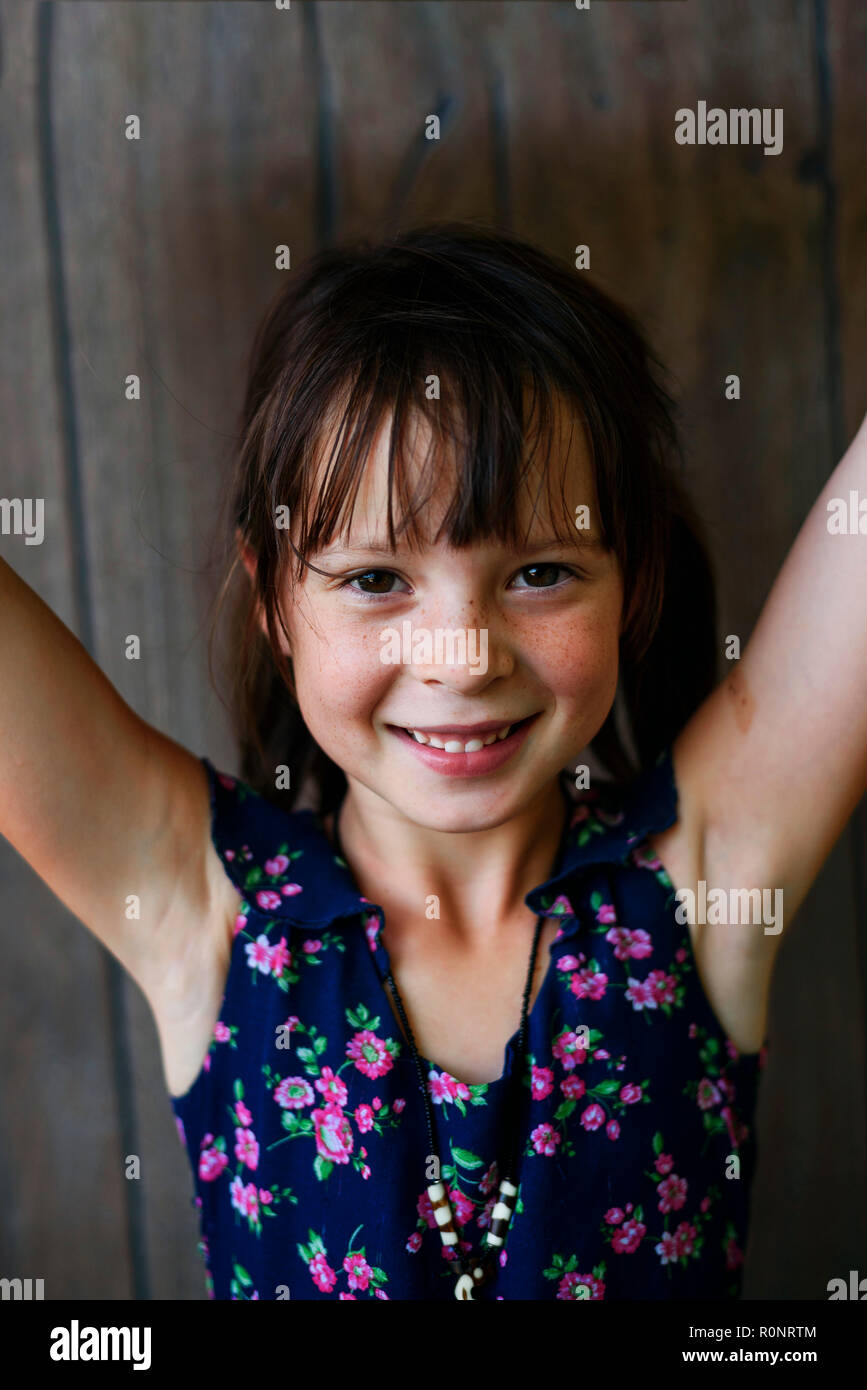Portrait girl standing arms hi-res stock photography and images - Alamy