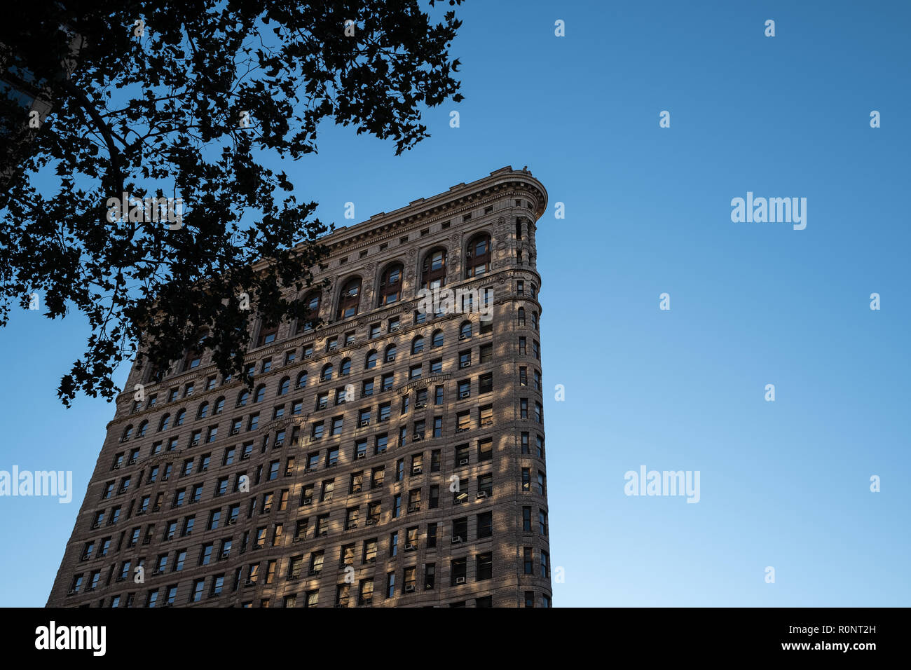 Urban scene flatiron building on hi-res stock photography and images ...