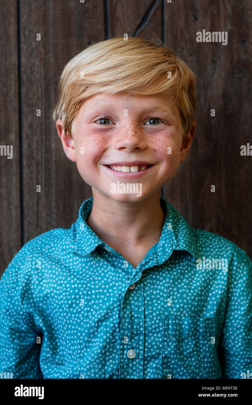 Portrait of a smiling boy with freckles Stock Photo - Alamy