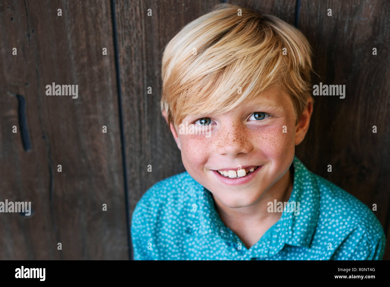 Portrait of a smiling boy with freckles Stock Photo - Alamy