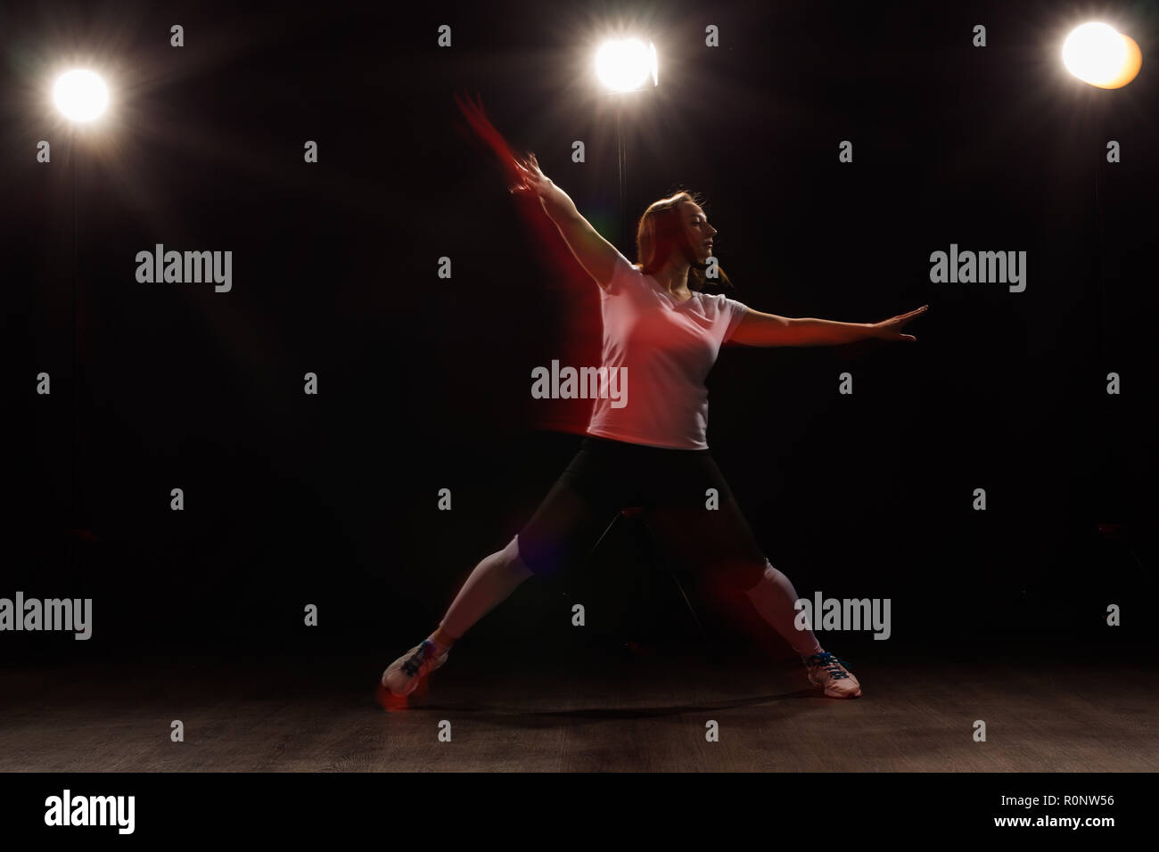 Dancing, sport, beautiful and people concept - young woman dancing in ...