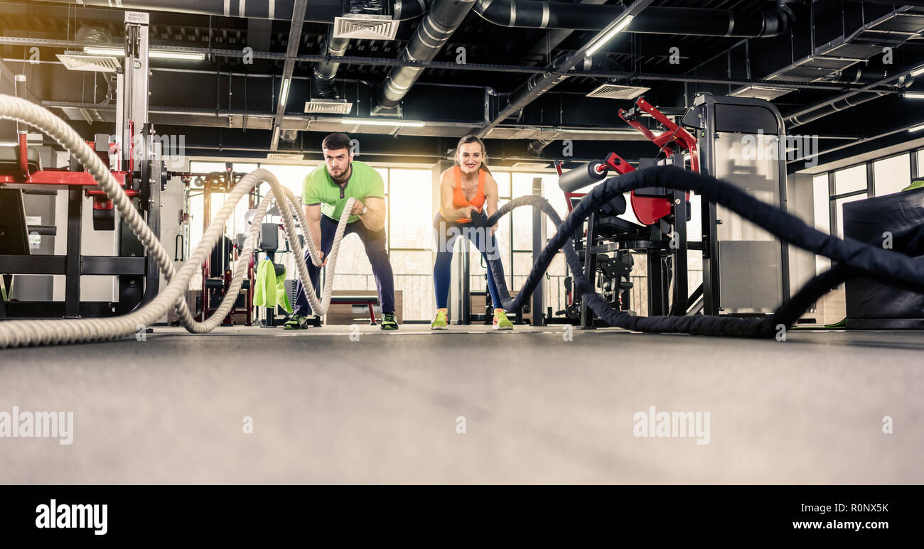 Keeping fit with rope training Stock Photo - Alamy