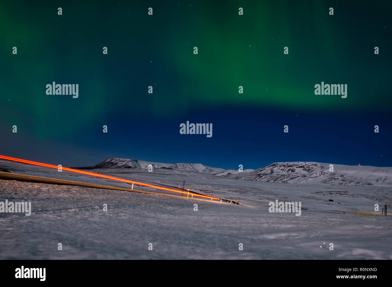 Northern lights over the mountain in reykjavik iceland hi-res stock ...