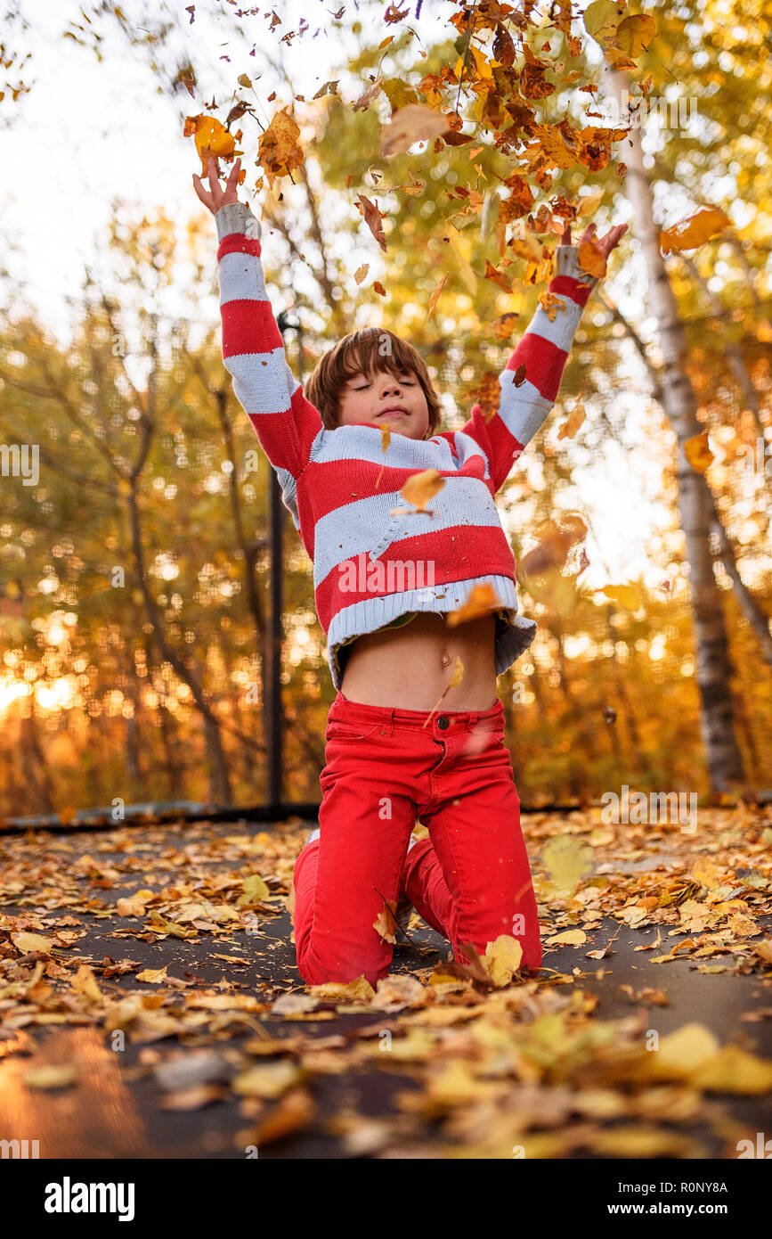Children kneeling hi-res stock photography and images - Alamy