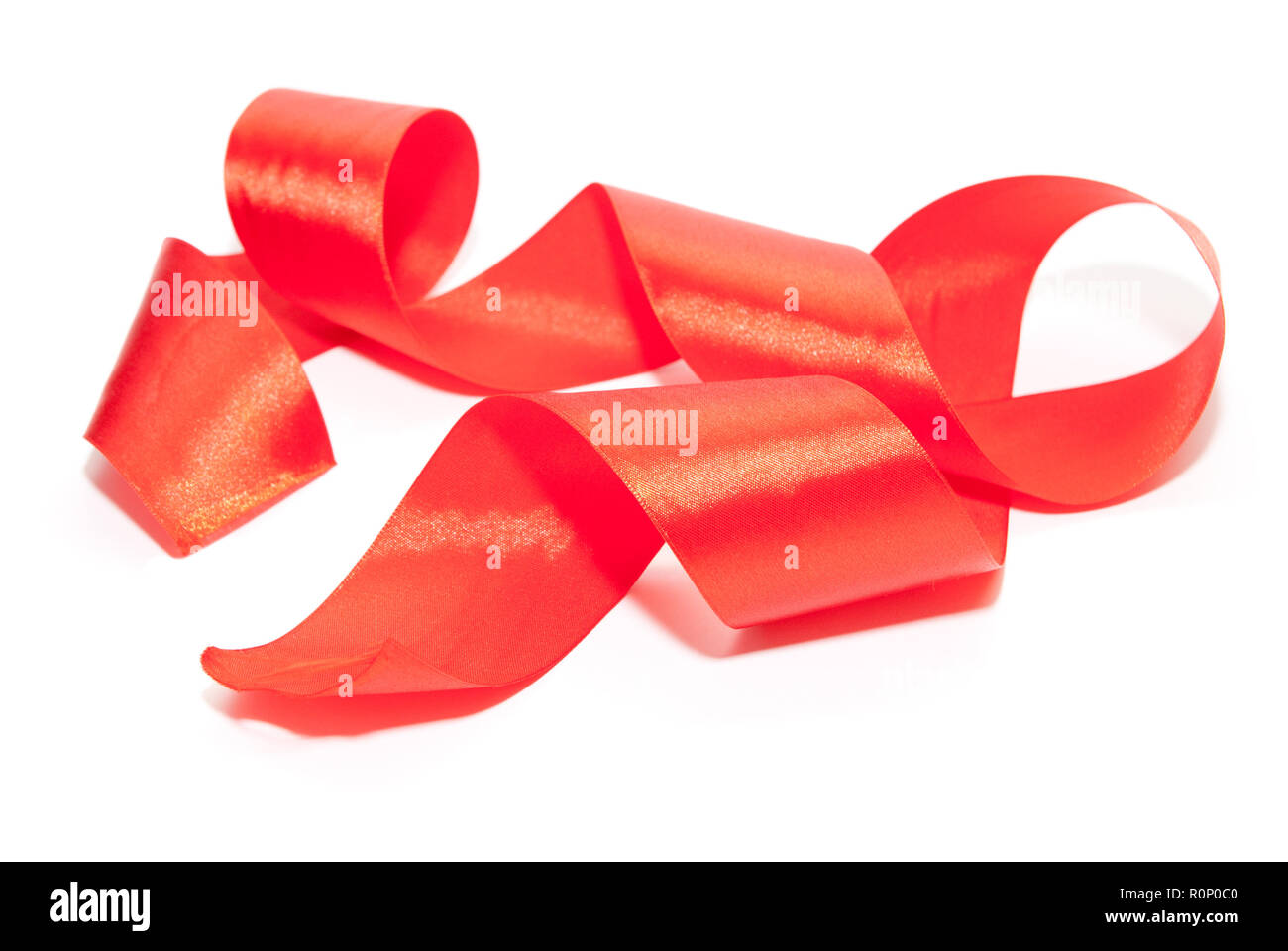 red ribbon isolated on a white background Stock Photo - Alamy