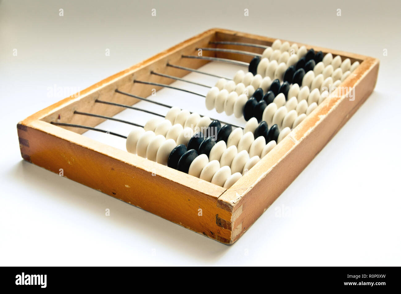 old abacus closeup on a grey background Stock Photo - Alamy
