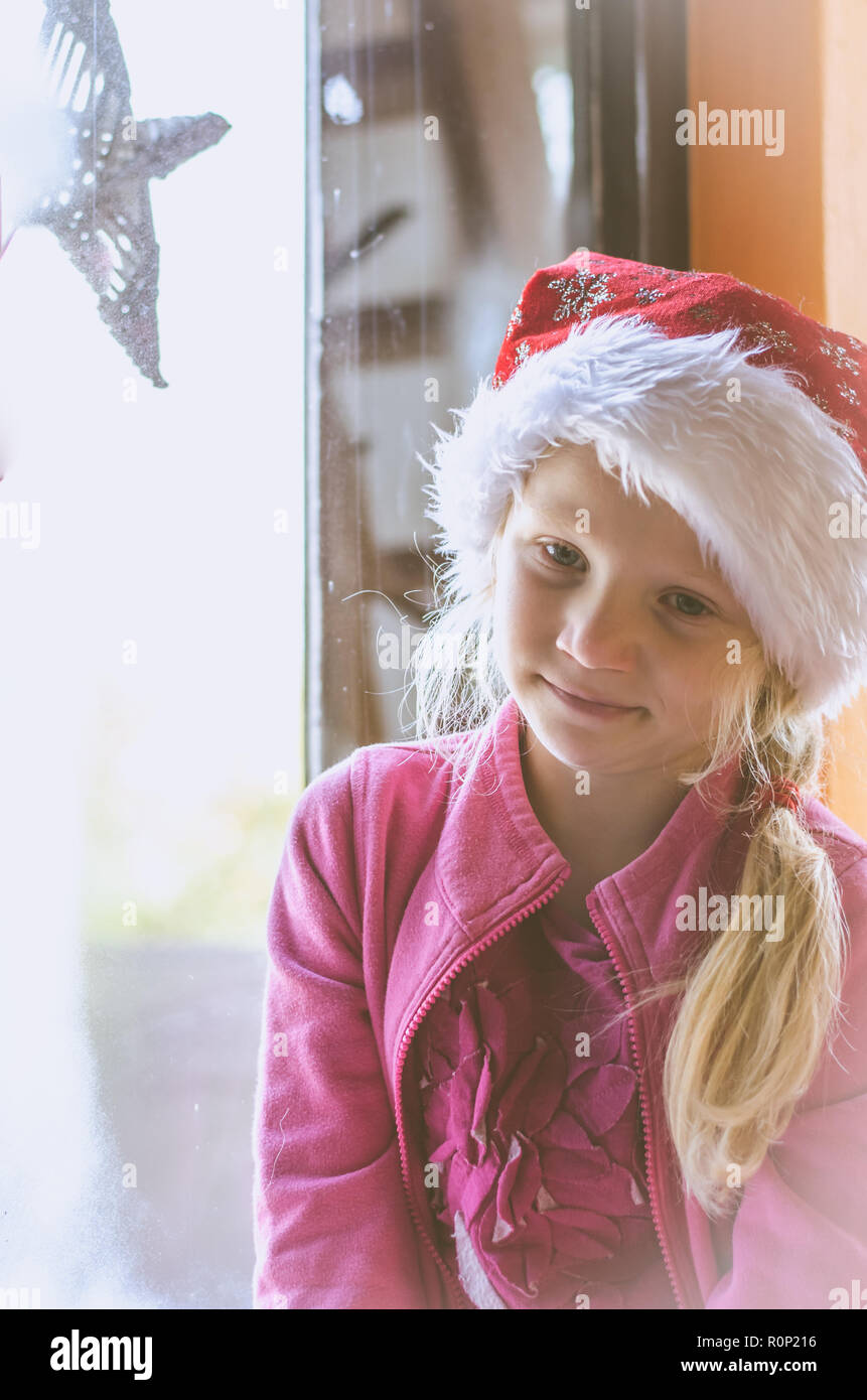 Lovely girl in christmas hi-res stock photography and images - Alamy