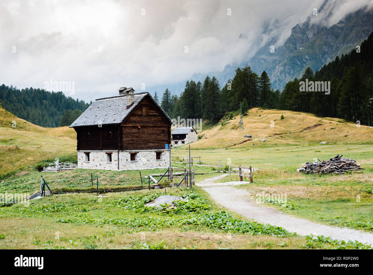 mountain house with flowers on the windows in the nature,Alpe Devero ...