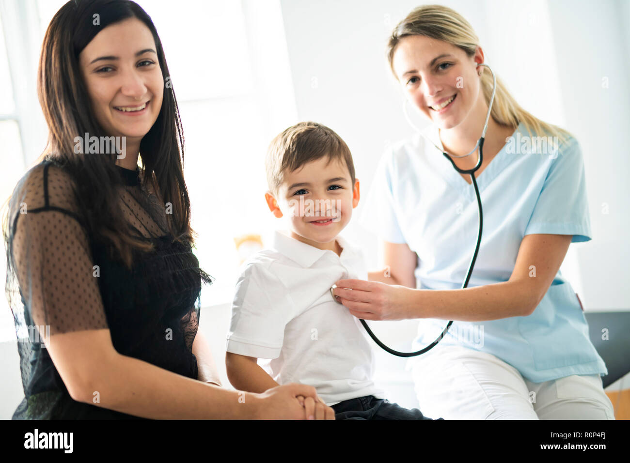 A cute Child Patient Visiting Doctor's Office Stock Photo - Alamy