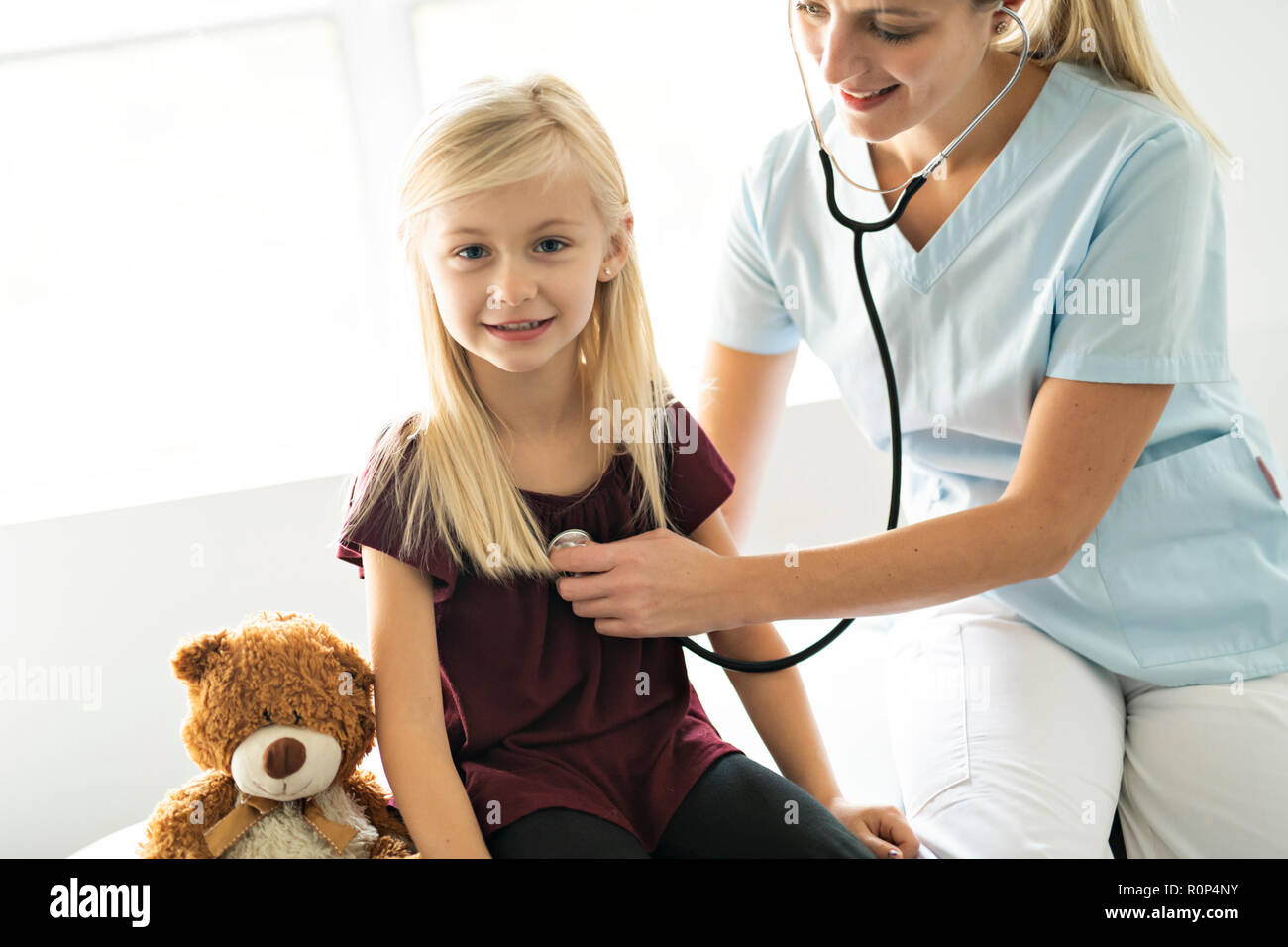 A cute Child Patient Visiting Doctor's Office Stock Photo - Alamy
