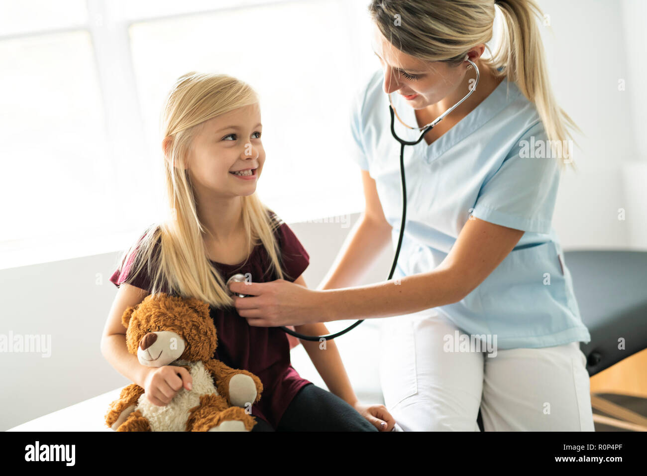 A cute Child Patient Visiting Doctor's Office Stock Photo - Alamy