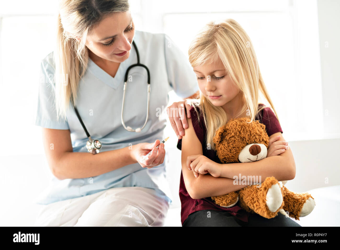 A cute Child Patient Visiting Doctor's Office Stock Photo - Alamy