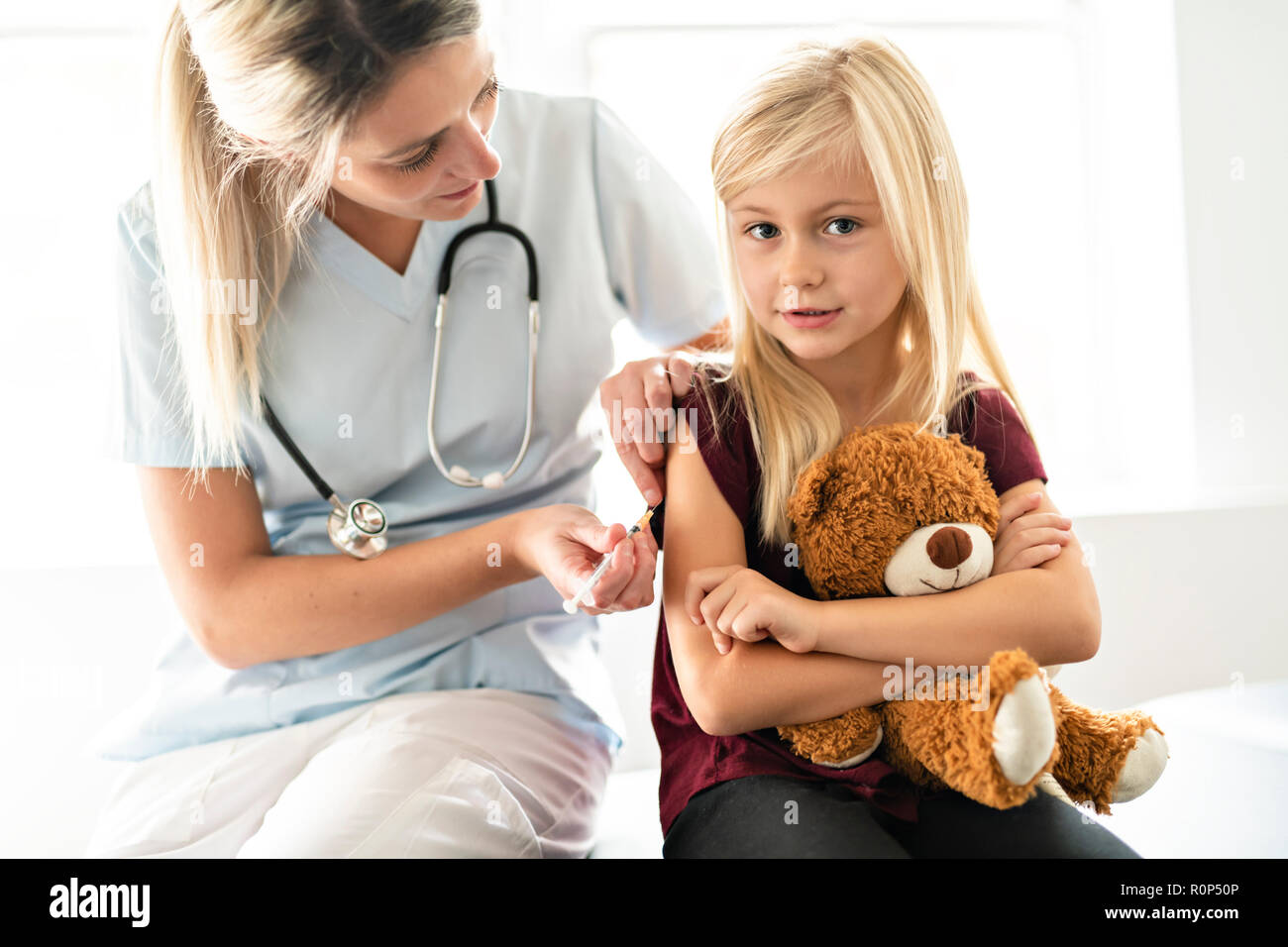 A cute Child Patient Visiting Doctor's Office Stock Photo - Alamy