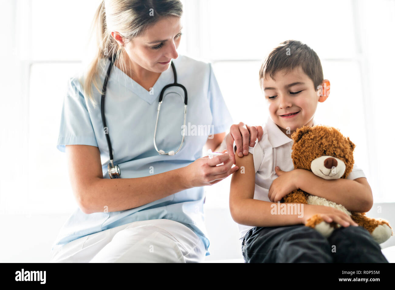 A cute Child Patient Visiting Doctor's Office Stock Photo - Alamy