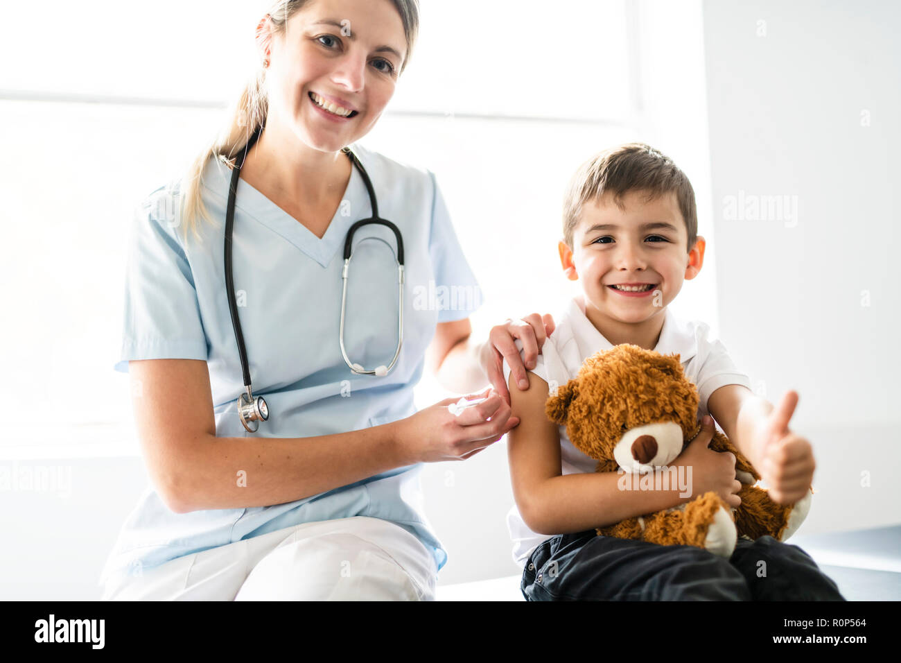 A cute Child Patient Visiting Doctor's Office Stock Photo - Alamy
