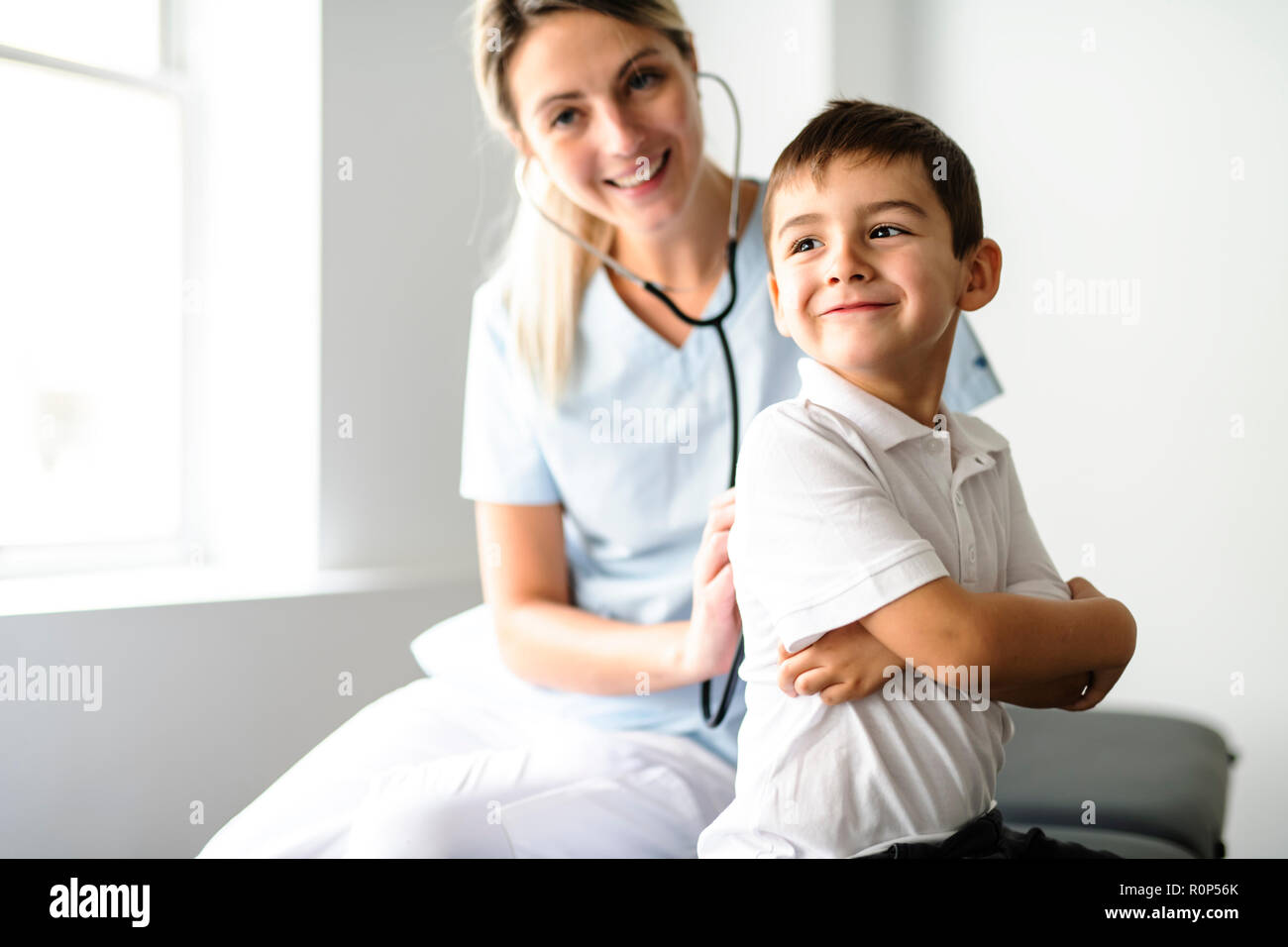 A cute Child Patient Visiting Doctor's Office Stock Photo - Alamy